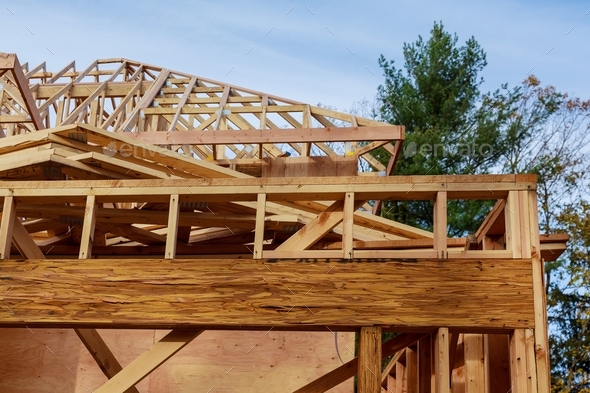New build roof with wooden truss, post and beam framework Stock Photo ...