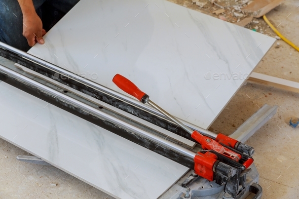 working with floor tile cutting equipment repair industrial tiler ...