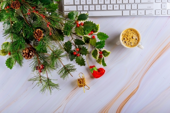 Christmas decoration tree with shiny office table with computer ...