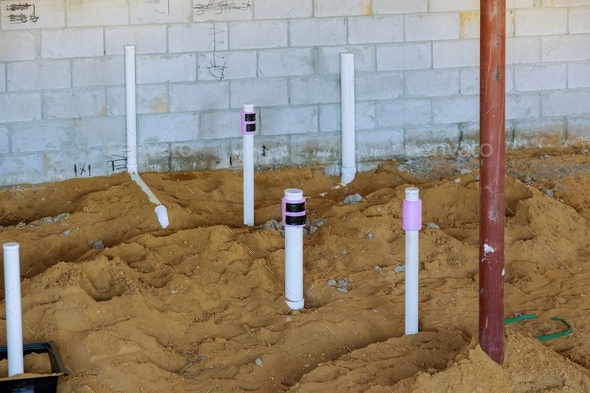 Pipeline with water and sewage new home under construction plumbing ...