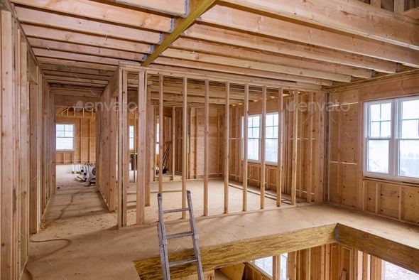 Wooden house frame structure on a new development Stock Photo by photovs