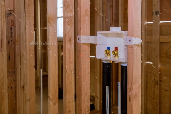 Installation of a laundry outlet boxes in a new house for connection of ...