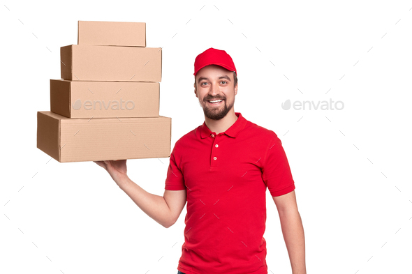 Smiling delivery man with carton boxes Stock Photo by kegfire | PhotoDune