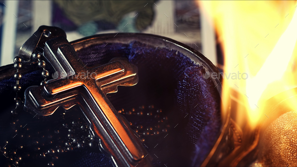 Christian Religion Symbol Cross on Fire Stock Photo by okanakdeniz