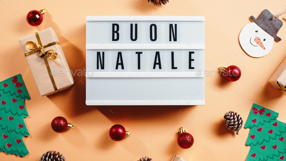 Merry Christmas in Italian language text on flat layer background ...