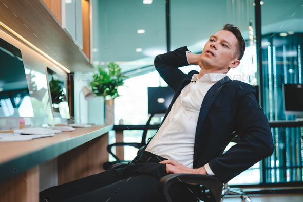 Tired and stressed office employee and manager resting and sleeping on ...
