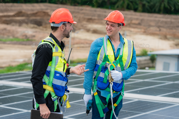 Green environmental energy concept, Technician workers team installing ...