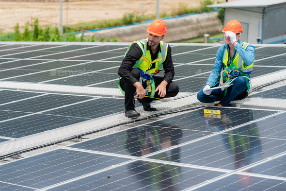 technician engineer working on checking maintenance service with solar ...