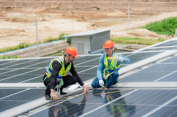 technician engineer working on checking maintenance service with solar ...