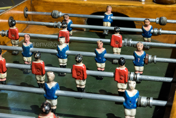 Vintage foosball table with hand painted figures Stock Photo by Photology75