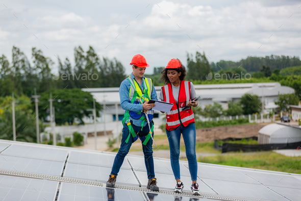 Green environmental energy concept, Technician workers team installing ...