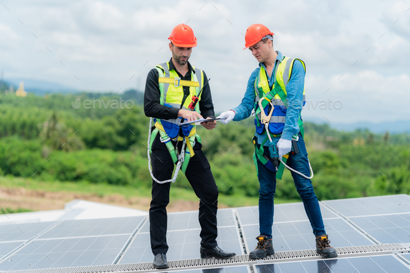 Green environmental energy concept, Technician workers team installing ...