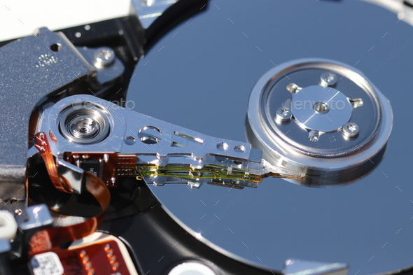 Open hard drive showing metal disk Stock Photo by antony-robinson ...