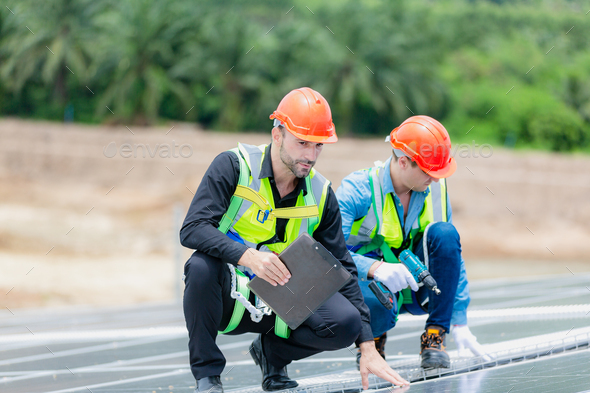 Green environmental energy concept, Technician workers team installing ...
