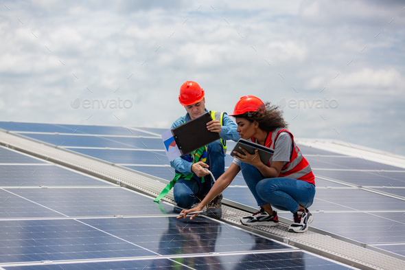 technician engineer working on checking maintenance service with solar ...