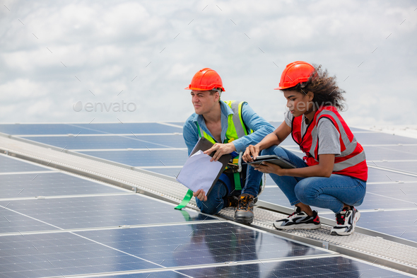 technician engineer team working to service and maintenance solar panel ...