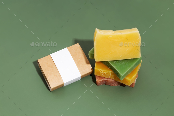 Stack of natural eco-friendly soaps with different additives and soap ...
