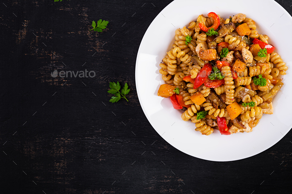 Vegetable pasta fusilli corti bucati with eggplant, sweet pepper and ...