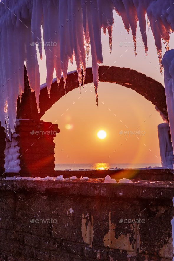 sun between ice window Stock Photo by EdVal | PhotoDune