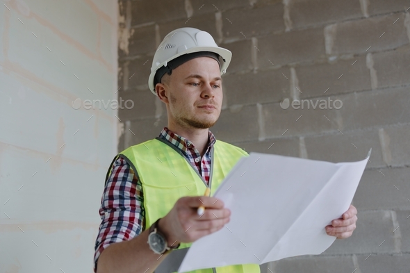 specialist engineer thinks and plans the work inside the premises of an ...