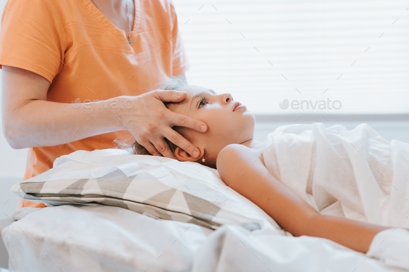 osteopath does therapy for kid girl. pediatric osteopathy treatment ...