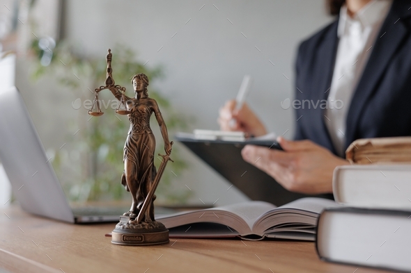 a statuette of the goddess of justice. a symbol of honesty and decency ...
