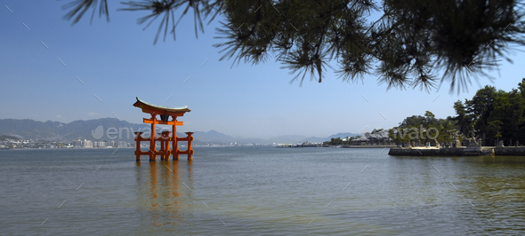 Red campher wood Torii Gate at Itsukushima Shrine on the island of ...