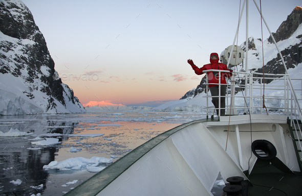 Adventure tourist on a Russian Icebreaker in the Lamaire Channel in ...