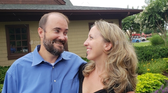 Happy couple millennials outdoors in candid portraits of married life ...