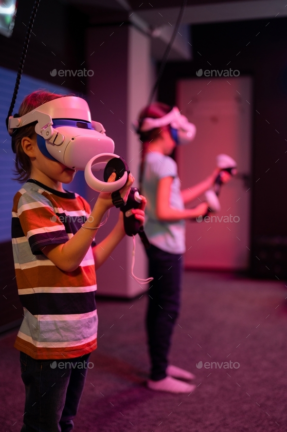 vr game and virtual reality. team kids friends gamers in 3d glasses ...