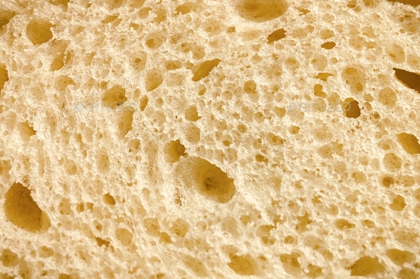 texture of white bread loaf as zoomed in background. backdrop of ...