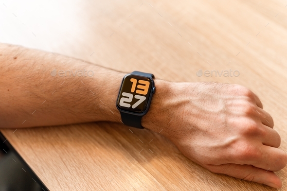 male hand wrist smart apple watch. man people use modern technology ...