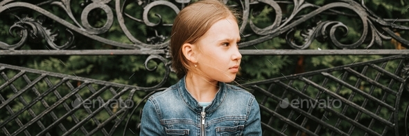 portrait of thoughtful frown kid girl observe nature environment. mind ...