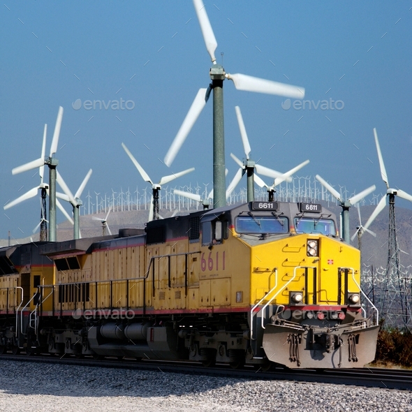 Locomotive passing wind turbines - California - United States of ...