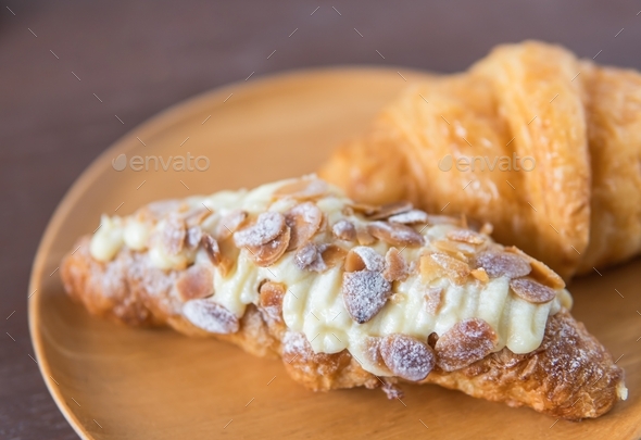 Croissant with topping cream almond Stock Photo by ssumetha | PhotoDune