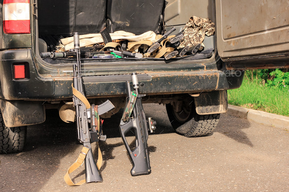 Lasertag or laser war tag equipment weapon in the trunk of the car ...