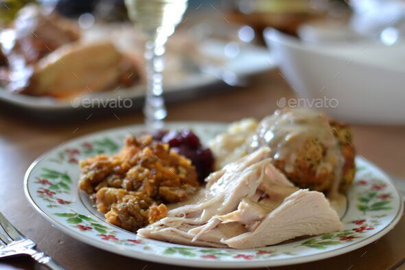 Thanksgiving dinner - Plate of turkey, dressing mashed potatoes gravy ...