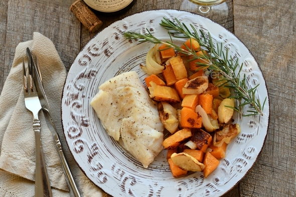 Overhead view of a delicious autumn meal of roasted butternut squash ...
