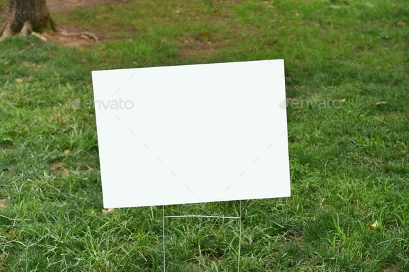 Blank white yard sign that has copy space for words, text, images ...