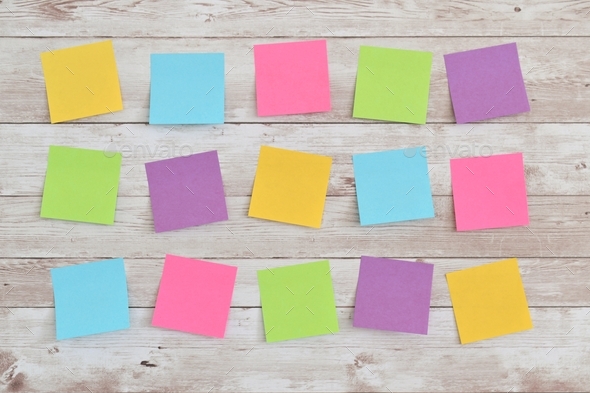 Blank copy space post-it sticky memo notes on a wall ready for messages ...