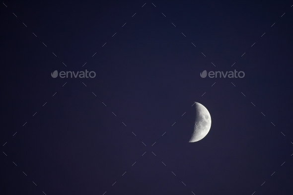 Partial half moon in a dark blue night sky Stock Photo by MargJohnsonVA