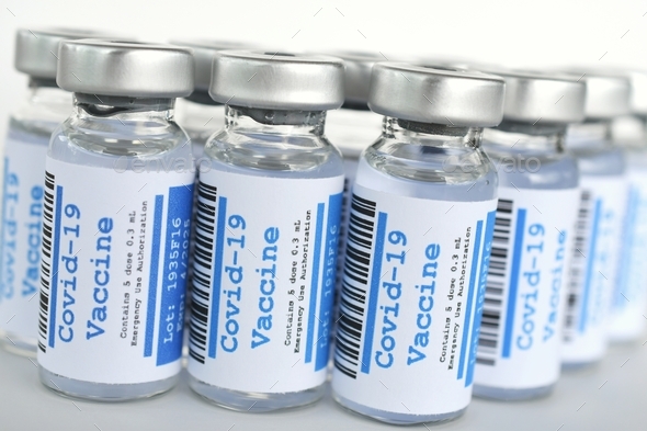 Covid-19 vaccination - multiple rows of vials of coronavirus vaccine ...
