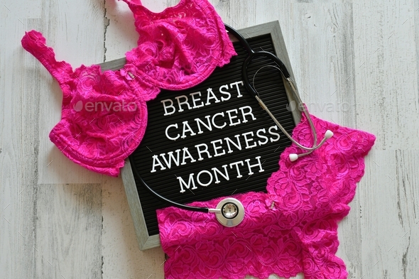 Message board sign with a stethoscope and pink lace bra promoting ...