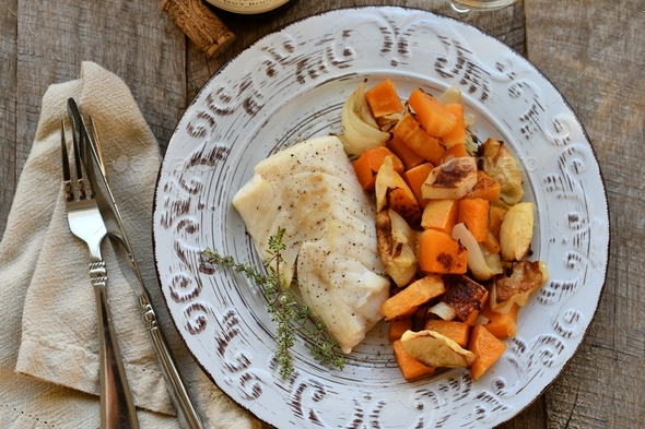 Overhead view of a delicious autumn meal of roasted butternut squash ...