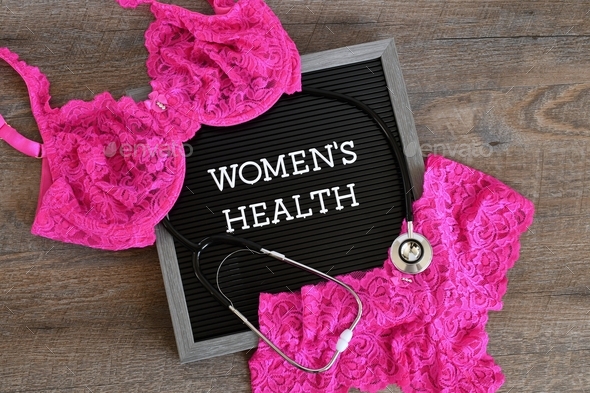 Women's Health message board sign with a stethoscope and pink lace bra ...