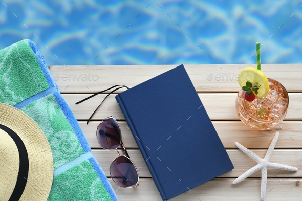 Summer vacation beach read book cover mock up. Flat lay of blank book ...