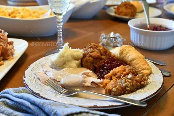 Thanksgiving dinner - Plate of turkey, dressing mashed potatoes gravy ...