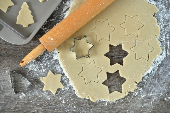 Baking Christmas cutout cookies with Christmas star tree cookie cutters ...
