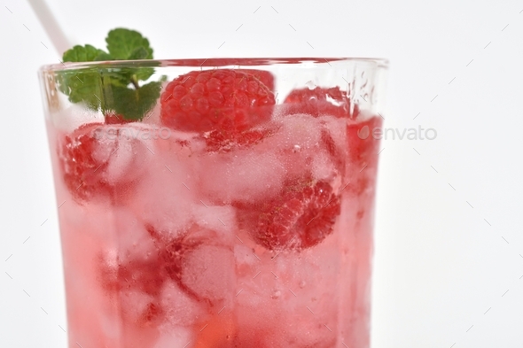 Pink raspberry soda pop tonic water seltzer over crushed ice garnished ...