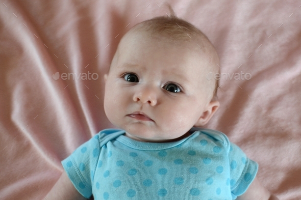 Cute sweet little baby infant with a pout sad look on her face. Stock ...